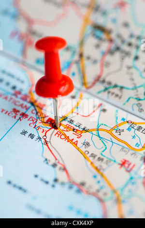 Thumbtack stuck in the map Stock Photo - Alamy
