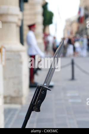 A Maltese honor guard with bayonet fixed to an L1A1 SLR rifle Stock ...