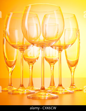 Wine glasses against gradient background Stock Photo - Alamy