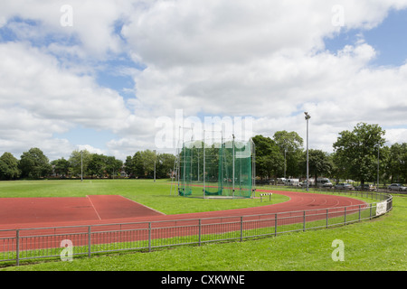 Field throwing event nets and running track at Bury Athletics Club ...