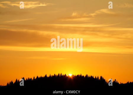 colorful sunset over the sea lake with dark red clouds in summer Stock ...