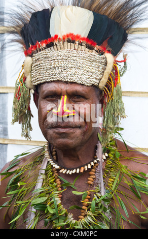 Tribal man wearing Koteka penis sheath at the Goroka Show singsing ...