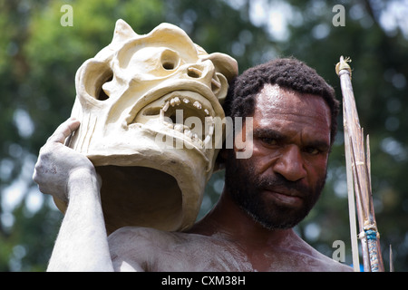Mud man wearing a mud mask at the singsing Goroka Festival, Papua New ...
