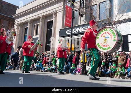 Shriners marching band participating in the St Patrick's Day parade in ...