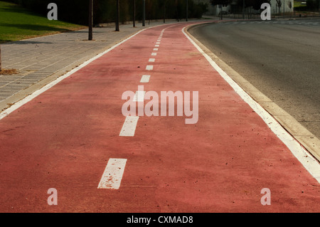 Red bike lanes and symbols Stock Photo - Alamy