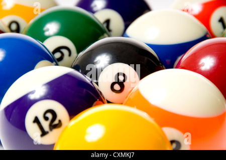 Brightly colored, new pool balls or billiard balls on white background ...