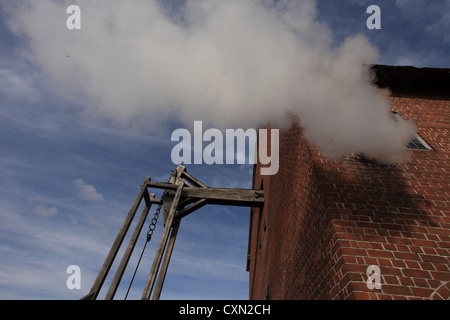 Working Newcomen steam engine used to pump water from flooded coal ...