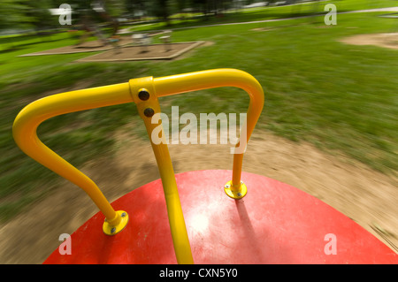 Children's Playground equipment - merry go round spinning very fast ...
