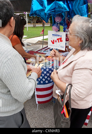 Voter registration booth at an outdoor church festival in Austin, Texas ...