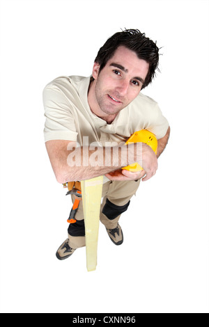 Carpenter staring up Stock Photo - Alamy