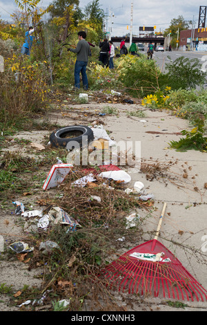 Volunteers Clean Trash and Weeds from Detroit Street Stock Photo - Alamy