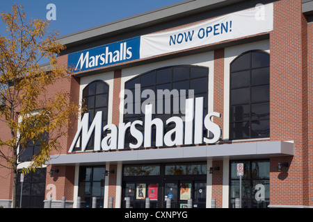 A logo sign outside of a Marshalls retail store location in Washington ...
