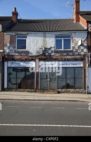 A derelict shop unit in the mining village of Maltby South Yorkshire ...