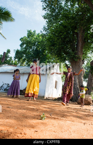 Indian girls playing games in a rural Indian village. Andhra Pradesh ...