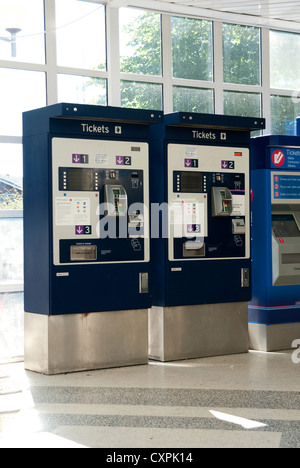 Ticket machines in the concourse area of a railway station in England ...