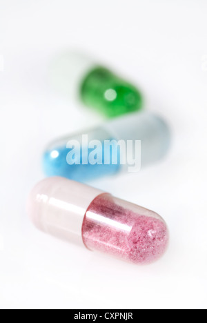 Pill capsules with an artificial and toxic looking content Stock Photo ...