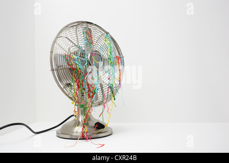 Electric fan with streamers Stock Photo - Alamy
