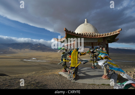 Chinese Mongolian pavilion adorned with Buddhist prayer flags flying in ...