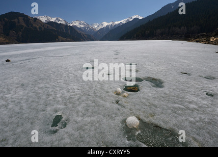 Frozen mountain lake Tian Chi, 5445m, Peak of God, Bogeda Feng, Heaven ...