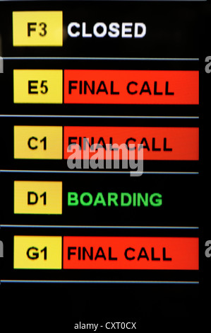 Airport departures information screen with Final Call in red Stock ...