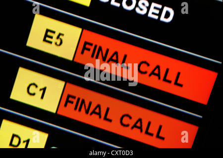 Airport departures information screen with Final Call in red Stock ...