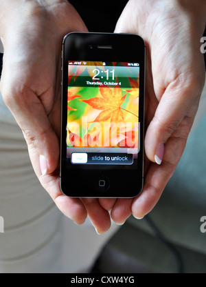 Hands holding mobile phone with main message on the display Stock Photo ...
