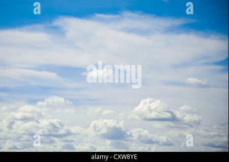 White sparse clouds over blue sky Stock Photo - Alamy