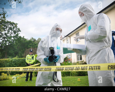 Crime scene investigation, forensic people at a murder scene. Police work, preservation of ...