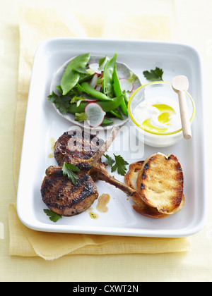 Closeup shot of sugar snap peas in a linen cloth bag on wooden ...