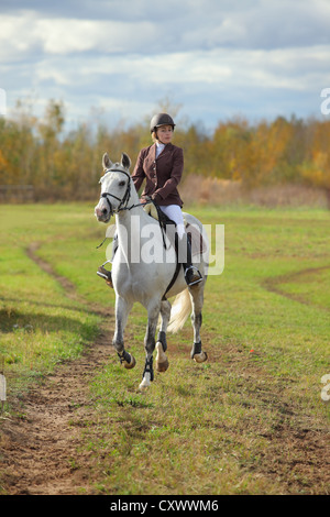 Girl horseback riding English style Stock Photo: 52713092 - Alamy