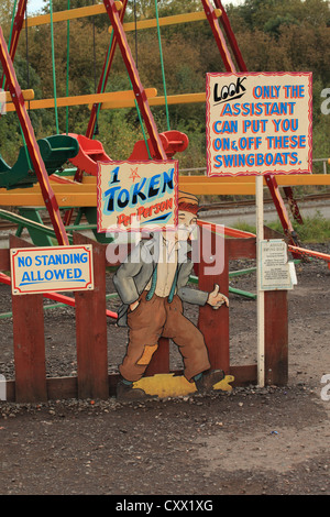 Signage used on a traditional British fairground ride Stock Photo - Alamy