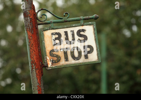 Old fashioned British bus stop sign Stock Photo - Alamy