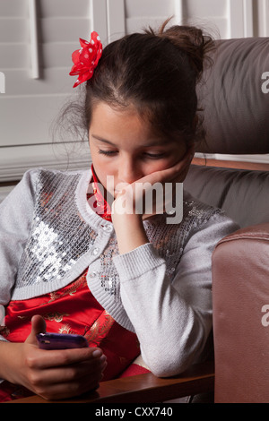 girl reading on smart phone in cafe Stock Photo - Alamy