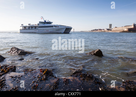 A Wightlink catamaran ferry makes its way into Portsmouth harbour with ...