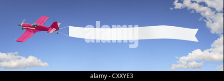 Plane pulling a blank banner in the sky, illustration Stock Photo - Alamy
