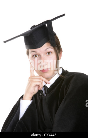 Young caucasian woman wearing graduation ceremony robe sitting on the ...