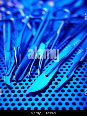 Surgical tool on blue table Stock Photo - Alamy