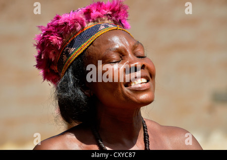 One of the wives of King Fon Abumbi II in traditional costume dancing ...