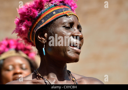 One of the wives of King Fon Abumbi II in traditional costume dancing ...