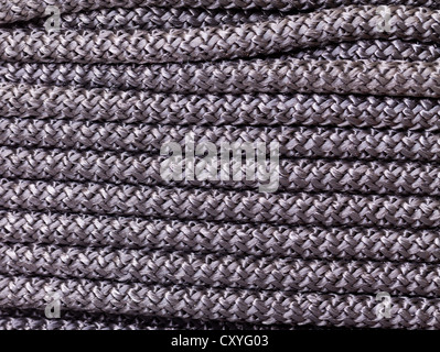 background of interwoven strands of cord Stock Photo - Alamy