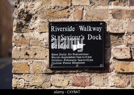 Sign on St Saviours Dock properties in Shad Thames, converted historic ...