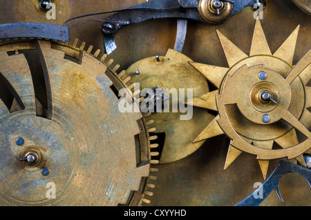 Cogs in a clock Stock Photo - Alamy