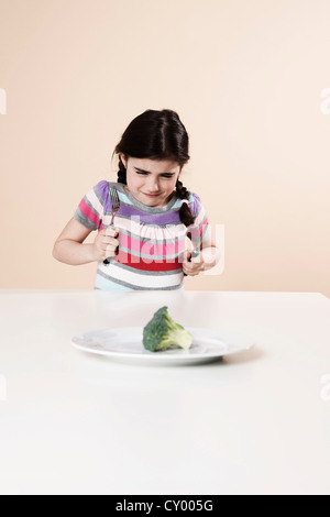 Disgust, food and dislike with child and broccoli for nutrition, health ...