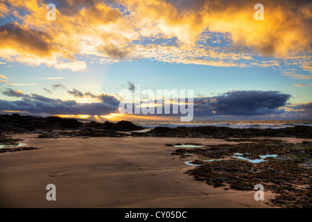 Sunset over rugged coastline of Sand Beach on a cool Fall evening in ...