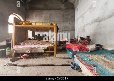 The cramped and rundown living quarters for labor workers at the San ...
