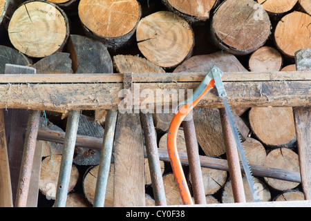 Stack of old saw timber. Round timber, wooden boards and beams Stock ...