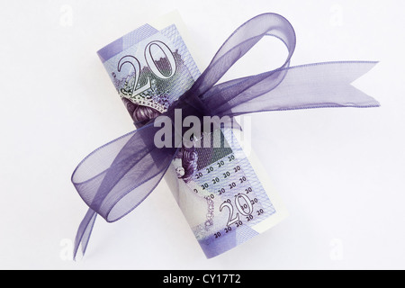 Twenty pound note rolled up for sniffing cocaine drug Stock Photo - Alamy