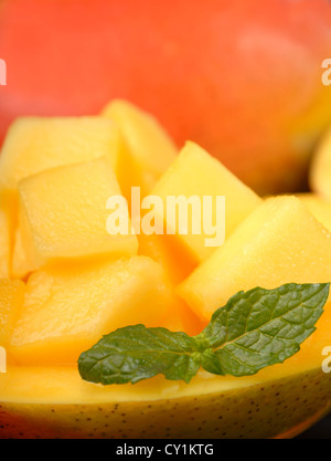 Mango sweet dessert served mint Stock Photo - Alamy