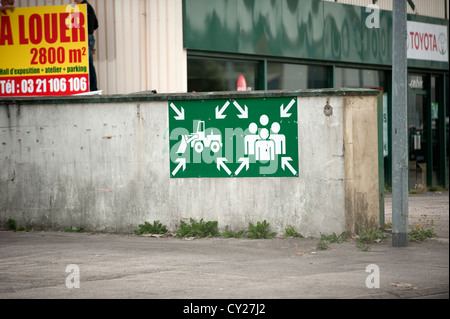 A emergency assembly point green sign isolated on white background ...