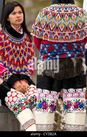 Inuit women in traditional skin clothing. Grise Fjord, Nunavut ...